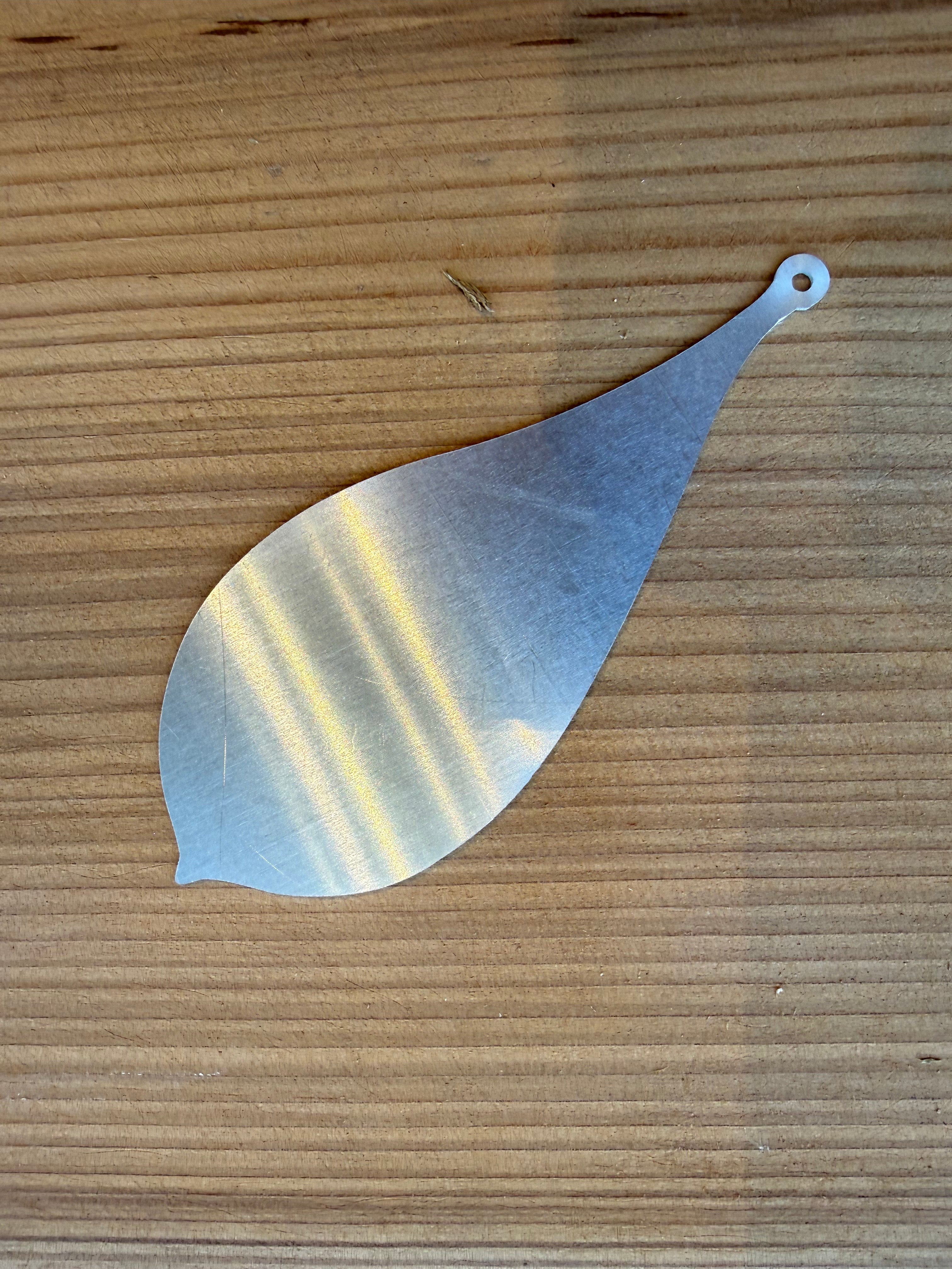 8: Laser Cut, by Kristin L. Tollefson – Northwind Art